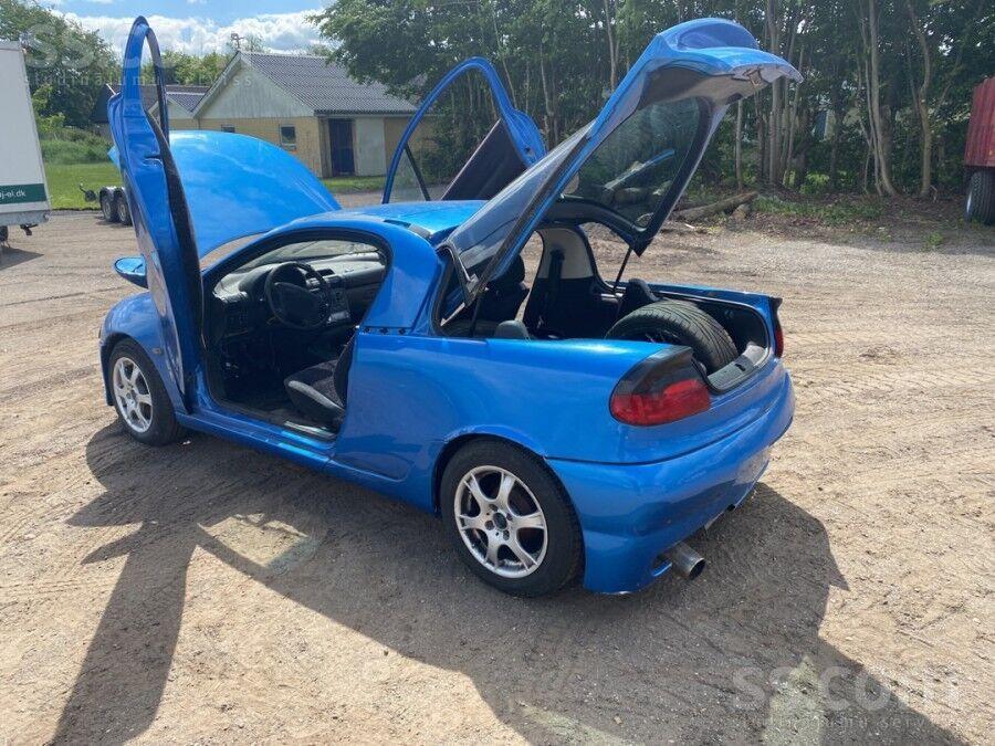 Zils Opel Tigra 1995 Rīga, ar dzinēja tilpumu 2.00 L un nobraukumu 214 tūkst. km par 900 €, foto 6 vietnē AUTOMOTO.COM.LV