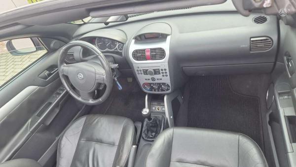 Grey Opel Tigra 2005 in Kelme, with an engine capacity of 1.25 L and mileage of 215 thousand km for 1750 €, photo 10 on AUTOMOTO.COM.LV