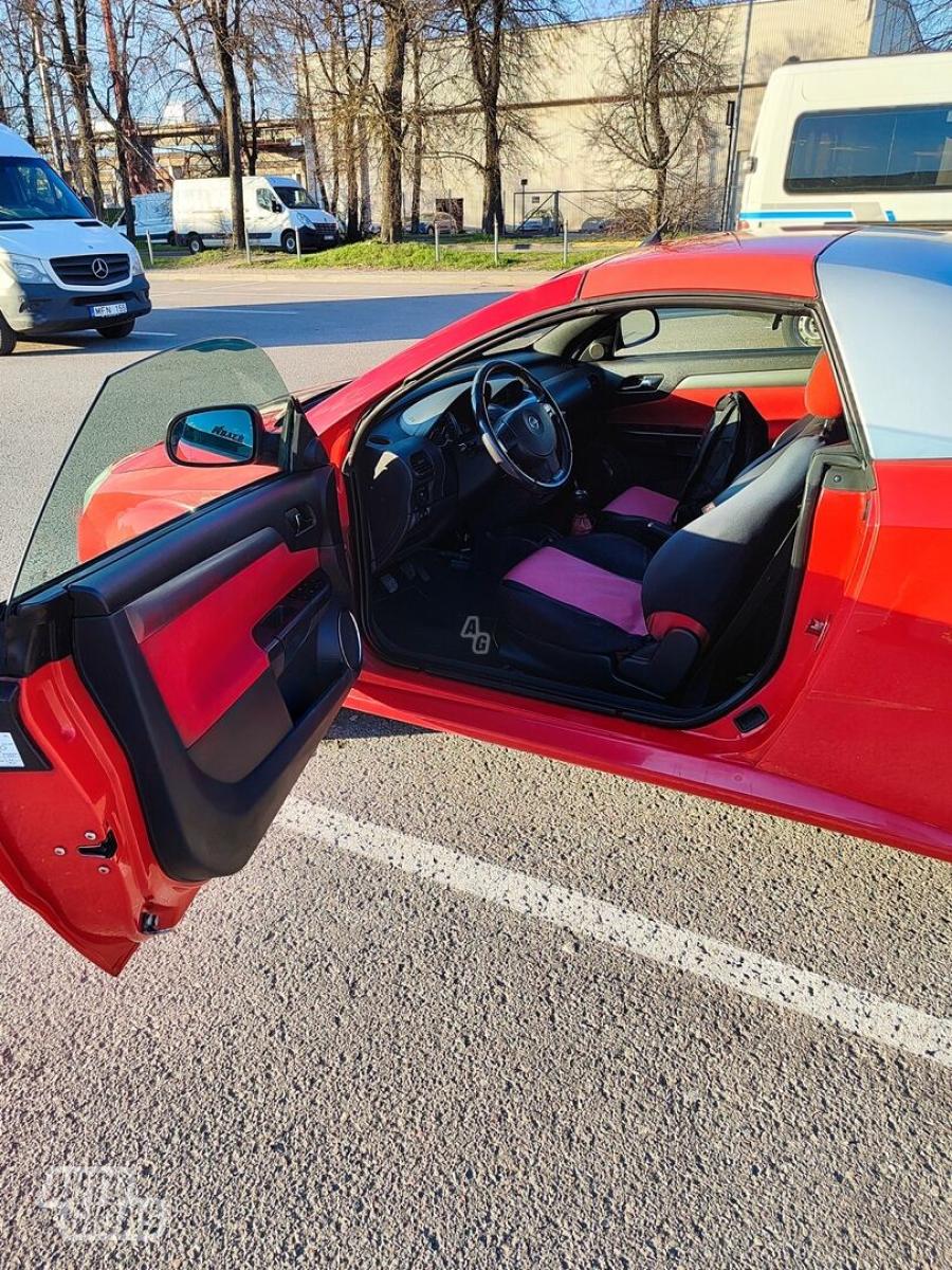 Sarkans Opel Tigra 2004 Viļņa, ar dzinēja tilpumu 1.40 L un nobraukumu 158 tūkst. km par 1500 €, foto 4 vietnē AUTOMOTO.COM.LV
