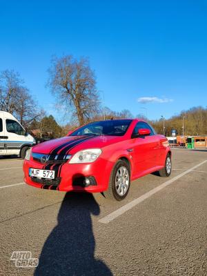 Sarkans Opel Tigra 2004 Viļņa, ar dzinēja tilpumu 1.40 L un nobraukumu 158 tūkst. km par 1500 €, foto 9 vietnē AUTOMOTO.COM.LV