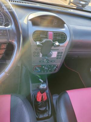 Sarkans Opel Tigra 2004 Viļņa, ar dzinēja tilpumu 1.40 L un nobraukumu 158 tūkst. km par 1500 €, foto 11 vietnē AUTOMOTO.COM.LV