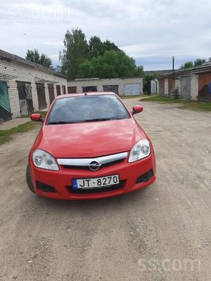 Sarkans Opel Tigra 2005 Dobele, ar dzinēja tilpumu 1.40 L un nobraukumu 210 tūkst. km par 1000 €, foto  vietnē AUTOMOTO.COM.LV