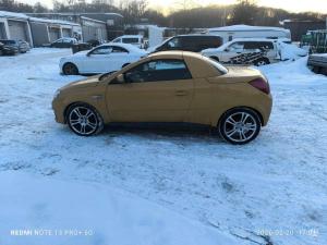 Yellow Opel Tigra 2000 in Kaunas, with an engine capacity of 1.30 L and mileage of 148 thousand km for 1000 €, photo 3 on AUTOMOTO.COM.LV