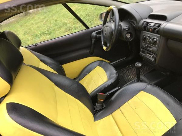 Yellow Opel Tigra 1997 in Talsi, with an engine capacity of 1.40 L and mileage of 199 thousand km for 2500 €, photo 5 on AUTOMOTO.COM.LV