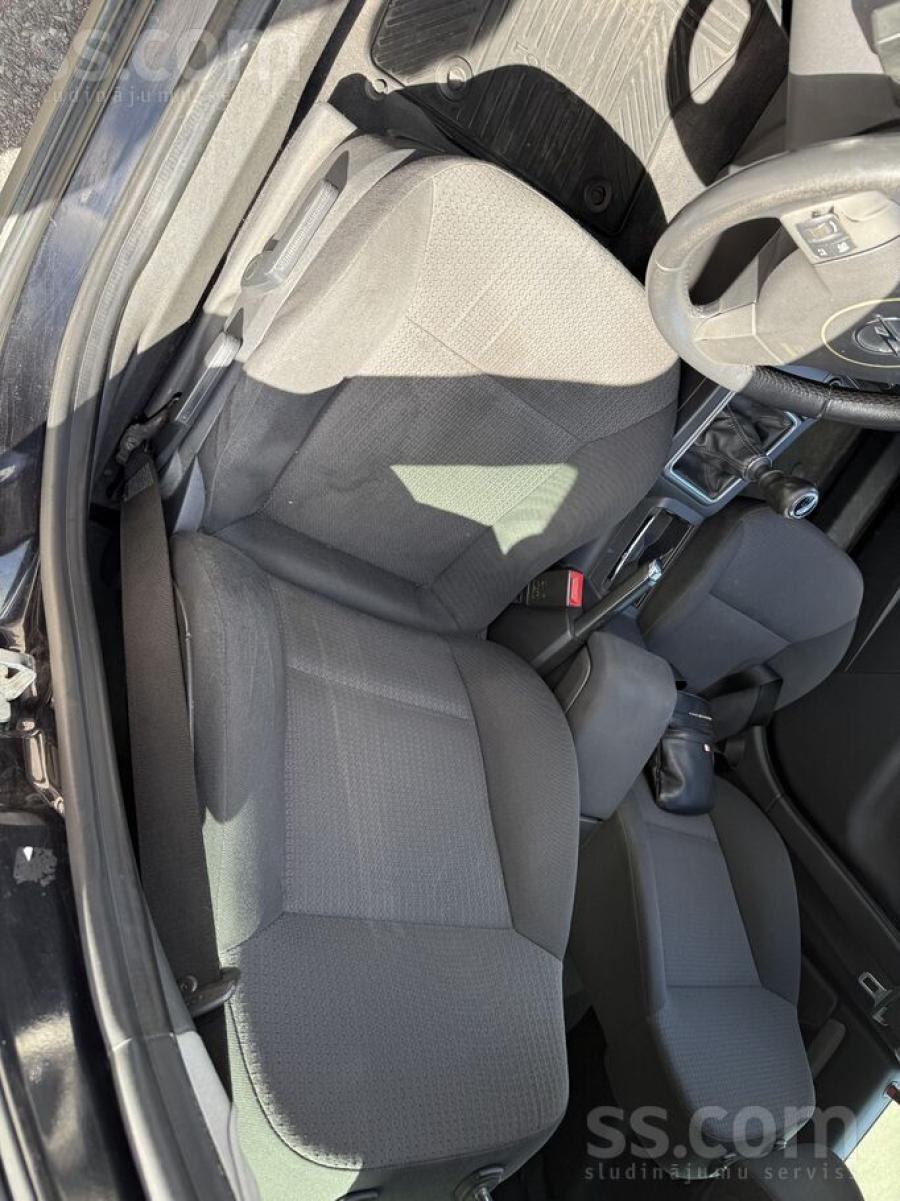 Black Opel Vectra 2008 in Riga, with an engine capacity of 1.90 L and mileage of 290 thousand km for 1450 €, photo 7 on AUTOMOTO.COM.LV