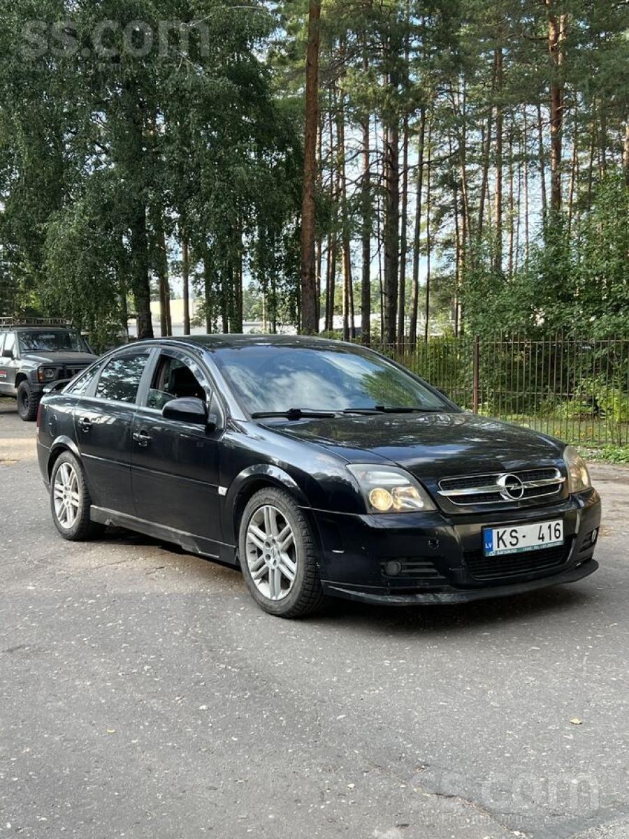 Black Opel Vectra 2003 in Riga, with an engine capacity of 2.20 L and mileage of 300 thousand km for 1200 €, photo 3 on AUTOMOTO.COM.LV