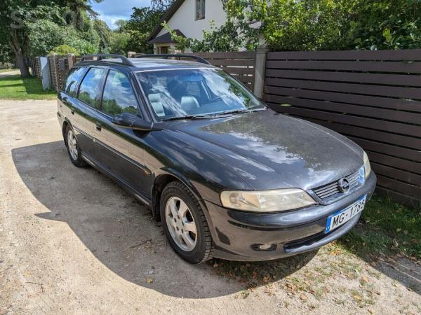 Black Opel Vectra 2002 in Riga, with an engine capacity of 1.80 L and mileage of 153 thousand km for 600 €, photo 1 on AUTOMOTO.COM.LV