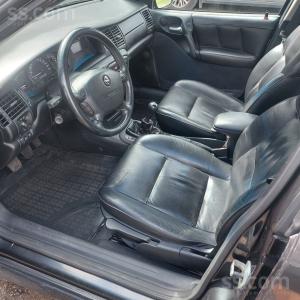 Black Opel Vectra 2002 in Riga, with an engine capacity of 1.80 L and mileage of 153 thousand km for 1350 €, photo 9 on AUTOMOTO.COM.LV