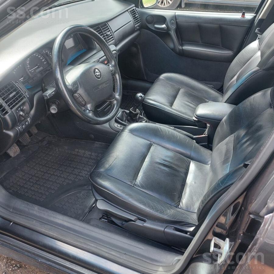 Black Opel Vectra 2002 in Riga, with an engine capacity of 1.80 L and mileage of 153 thousand km for 1350 €, photo 9 on AUTOMOTO.COM.LV