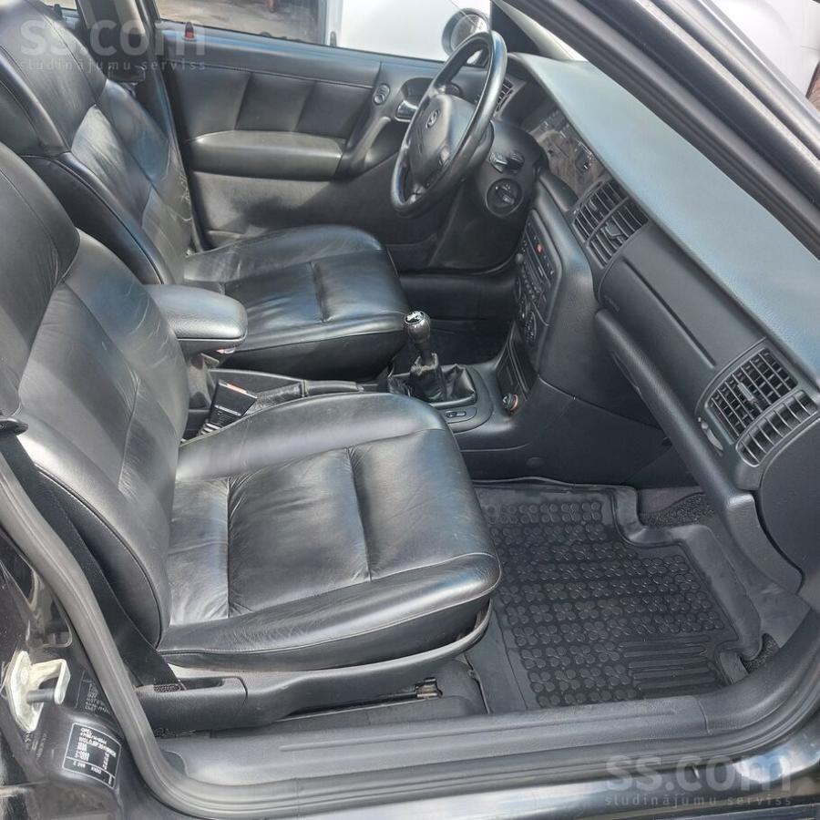 Black Opel Vectra 2002 in Riga, with an engine capacity of 1.80 L and mileage of 153 thousand km for 1350 €, photo 13 on AUTOMOTO.COM.LV