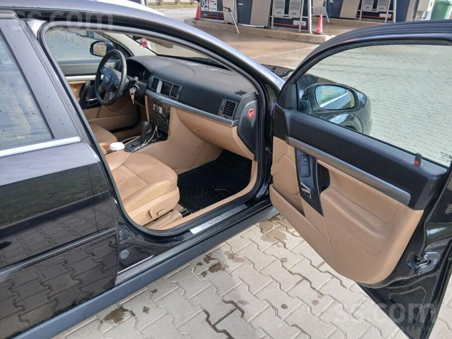 Black Opel Vectra 2005 in Jelgava, with an engine capacity of 1.90 L and mileage of 300 thousand km for 1399 €, photo 8 on AUTOMOTO.COM.LV