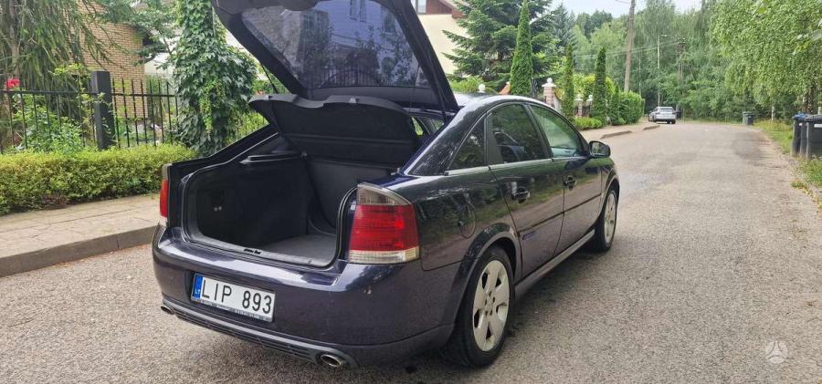 Blue Opel Vectra 2006 in Vilnius, with an engine capacity of 2.20 L and mileage of 200 thousand km for 999 €, photo 12 on AUTOMOTO.COM.LV