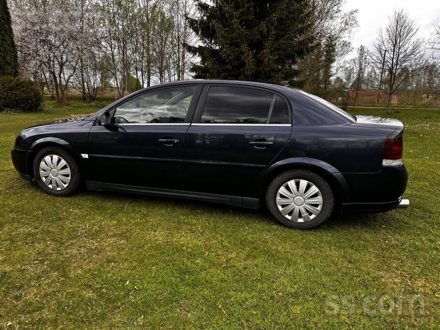 Blue Opel Vectra 2002 in Riga, with an engine capacity of 2.00 L and mileage of 291 thousand km for 980 €, photo 11 on AUTOMOTO.COM.LV
