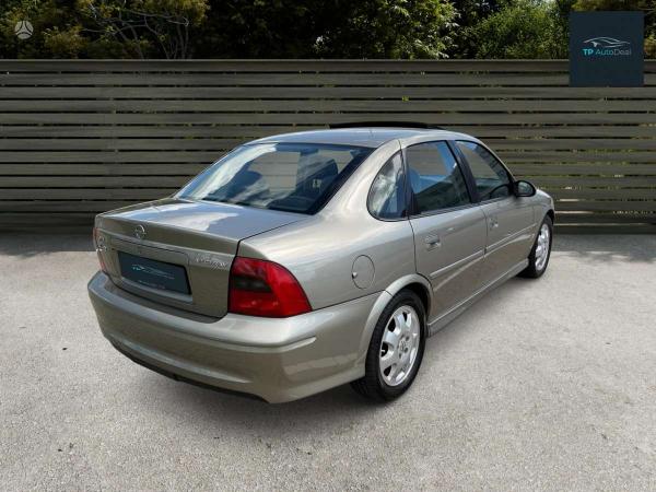 Grey Opel Vectra 1999 in Kaunas, with an engine capacity of 2.50 L and mileage of 299 thousand km for 2250 €, photo 5 on AUTOMOTO.COM.LV