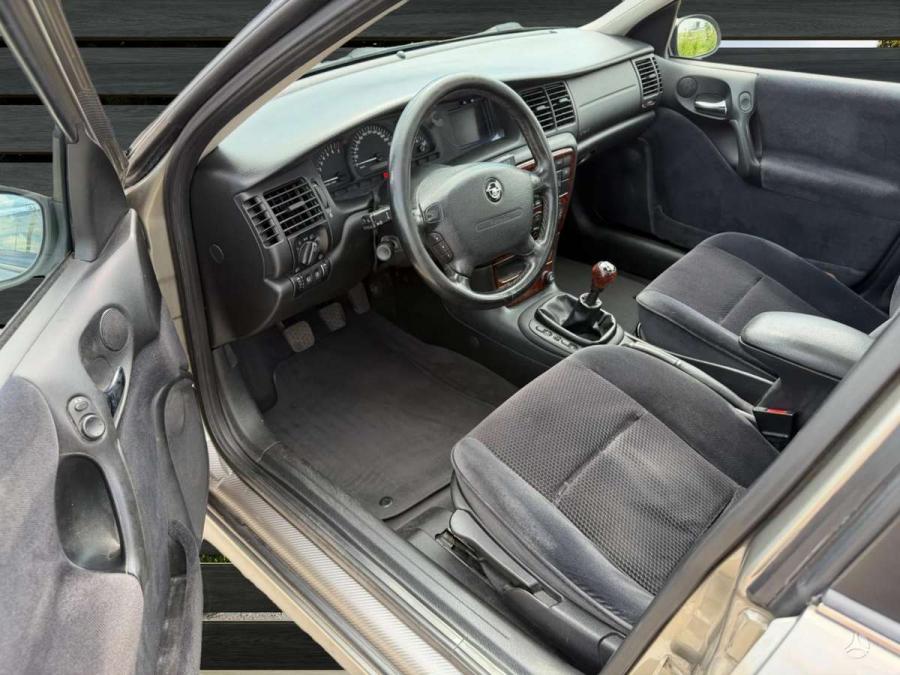 Pelēks Opel Vectra 1999 Kauņa, ar dzinēja tilpumu 2.50 L un nobraukumu 299 tūkst. km par 2250 €, foto 12 vietnē AUTOMOTO.COM.LV