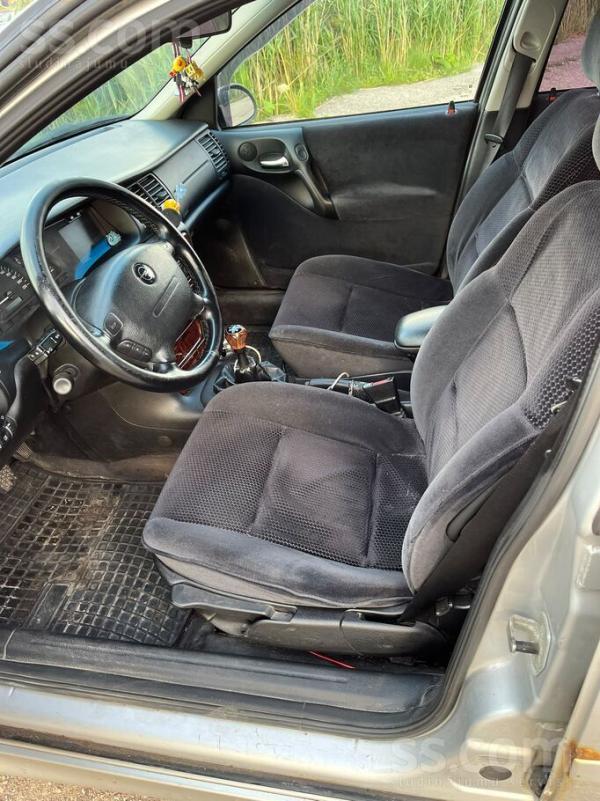 Grey Opel Vectra 2002 in Riga, with an engine capacity of 2.00 L and mileage of 219 thousand km for 1200 €, photo 7 on AUTOMOTO.COM.LV