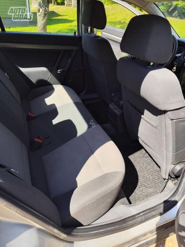 Grey Opel Vectra 2004 in Utena, with an engine capacity of 2.00 L and mileage of 203 thousand km for 1499 €, photo 9 on AUTOMOTO.COM.LV