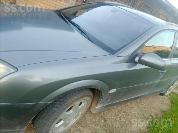 Pelēks Opel Vectra 2004 Jēkabpils, ar dzinēja tilpumu 1.90 L un nobraukumu 345 tūkst. km par 1000 €, foto 7 vietnē AUTOMOTO.COM.LV