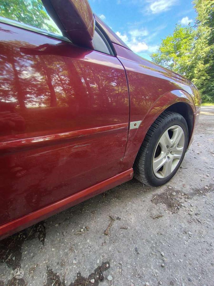 Sarkans Opel Vectra 2006 Panevēža, ar dzinēja tilpumu 1.91 L un nobraukumu 176 tūkst. km par 1000 €, foto 22 vietnē AUTOMOTO.COM.LV