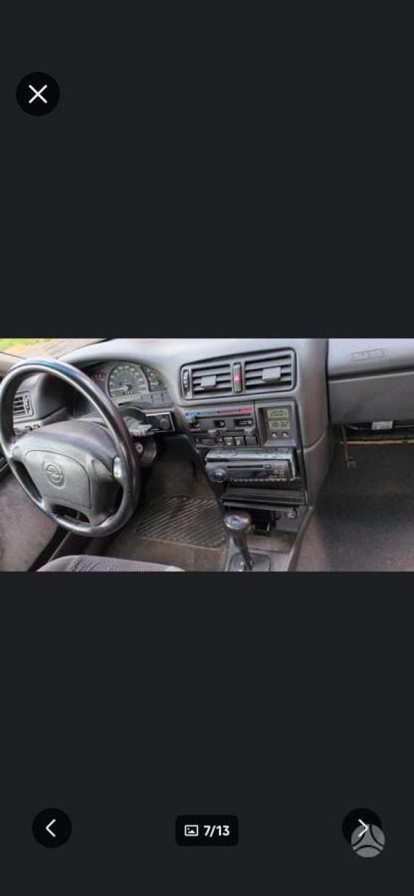 Red Opel Vectra 1994 in Marijampole, with an engine capacity of 2.00 L and mileage of 250 thousand km for 2200 €, photo 10 on AUTOMOTO.COM.LV