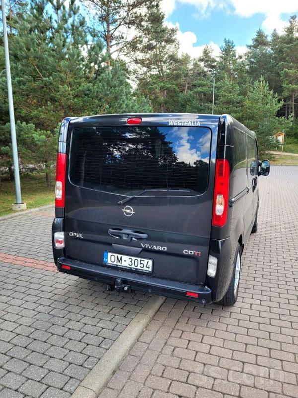 Black Opel Vivaro 2011 in Ventspils, with an engine capacity of 2.50 L and mileage of 291 thousand km for 11500 €, photo 5 on AUTOMOTO.COM.LV