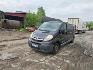 Black Opel Vivaro 2012 in Riga, with an engine capacity of 2.00 L and mileage of 290 thousand km for 4950 €, photo  on AUTOMOTO.COM.LV