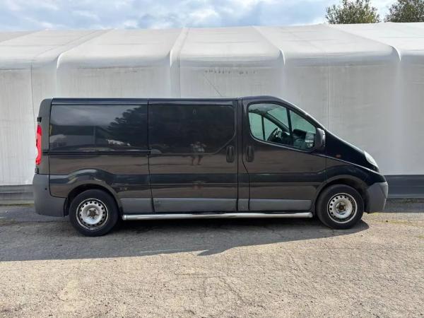 Black Opel Vivaro 2012 in Ogre, with an engine capacity of 2.00 L and mileage of 232 thousand km for 5250 €, photo 1 on AUTOMOTO.COM.LV