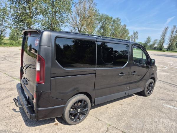 Black Opel Vivaro 2015 in Liepaja, with an engine capacity of 1.60 L and mileage of 280 thousand km for 10500 €, photo 3 on AUTOMOTO.COM.LV