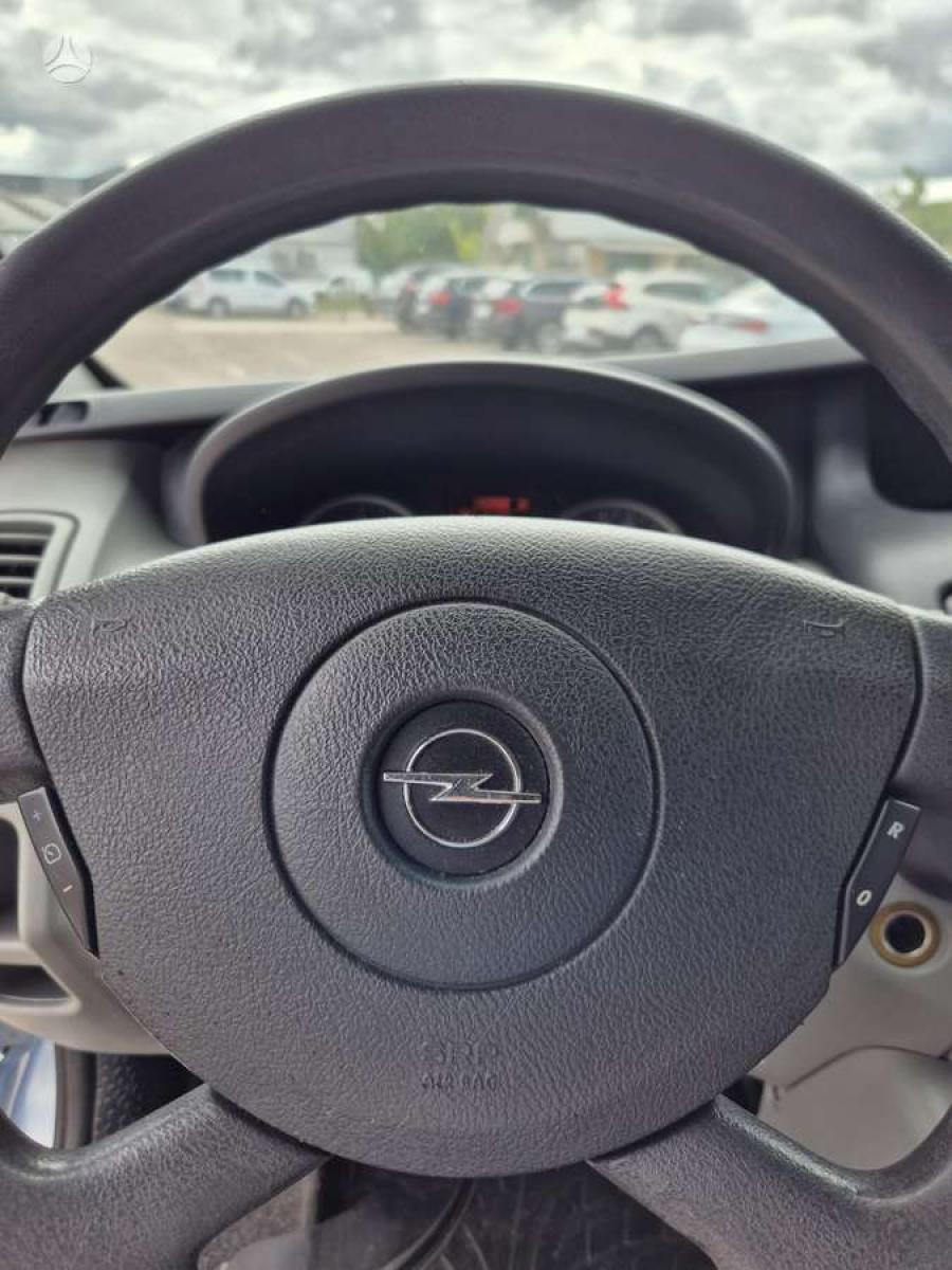 Blue Opel Vivaro 2014 in Mazeikiai, with an engine capacity of 2.00 L and mileage of 430 thousand km for 7650 €, photo 15 on AUTOMOTO.COM.LV