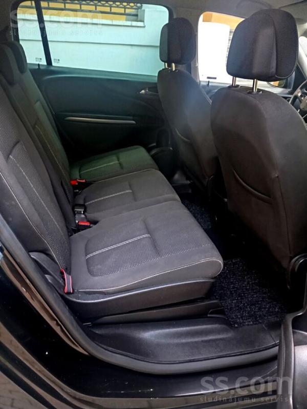 Black Opel Zafira 2016 in Liepaja, with an engine capacity of 2.00 L and mileage of 312 thousand km for 8500 €, photo 7 on AUTOMOTO.COM.LV