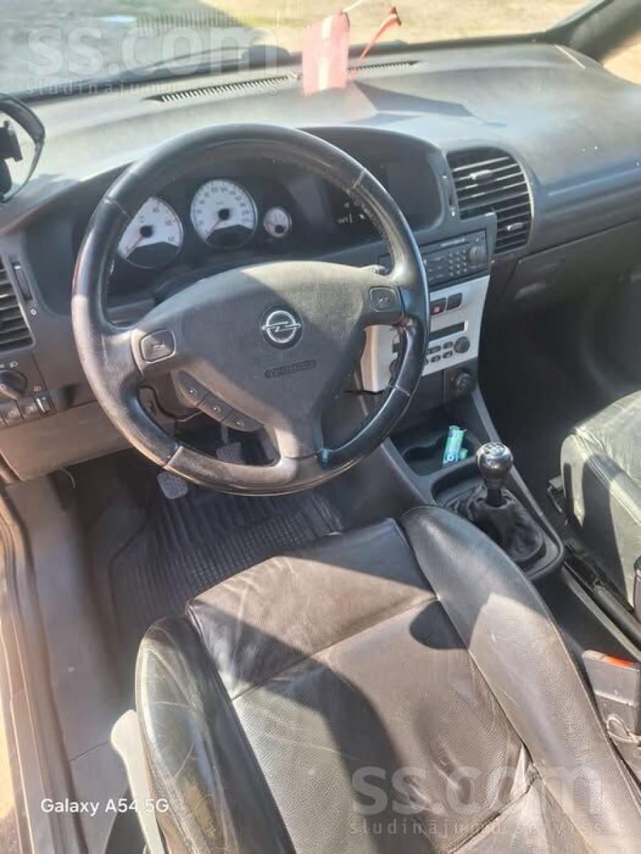 Melns Opel Zafira 2004 Limbaži, ar dzinēja tilpumu 2.20 L un nobraukumu 483 tūkst. km par 1050 €, foto 6 vietnē AUTOMOTO.COM.LV