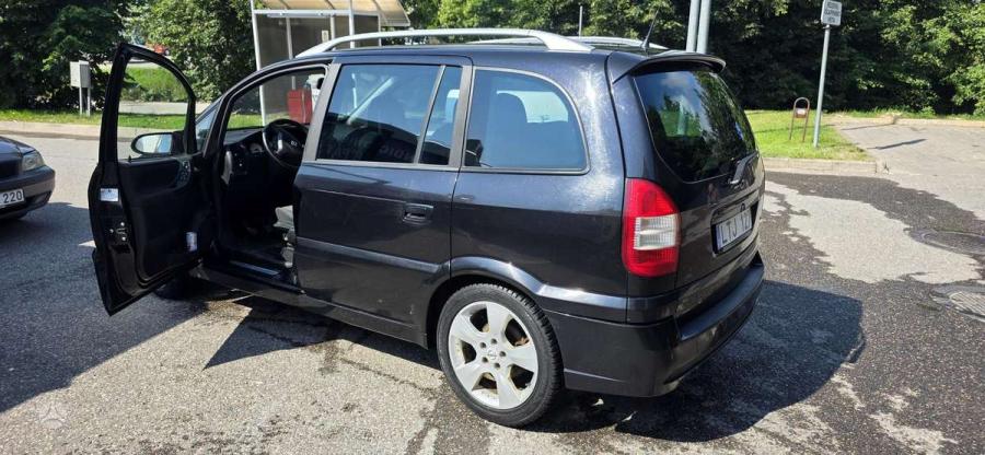 Melns Opel Zafira 2004 Viļņa, ar dzinēja tilpumu 1.80 L un nobraukumu 257 tūkst. km par 1200 €, foto 4 vietnē AUTOMOTO.COM.LV