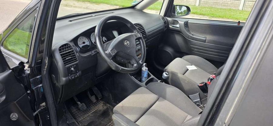 Melns Opel Zafira 2004 Viļņa, ar dzinēja tilpumu 1.80 L un nobraukumu 257 tūkst. km par 1200 €, foto 9 vietnē AUTOMOTO.COM.LV
