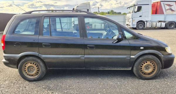 Black Opel Zafira 2004 in Vilnius, with an engine capacity of 2.00 L and mileage of 305 thousand km for 390 €, photo 7 on AUTOMOTO.COM.LV