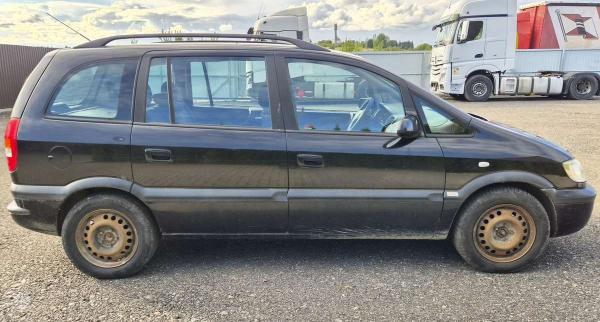 Melns Opel Zafira 2004 Viļņa, ar dzinēja tilpumu 2.00 L un nobraukumu 305 tūkst. km par 350 €, foto 7 vietnē AUTOMOTO.COM.LV
