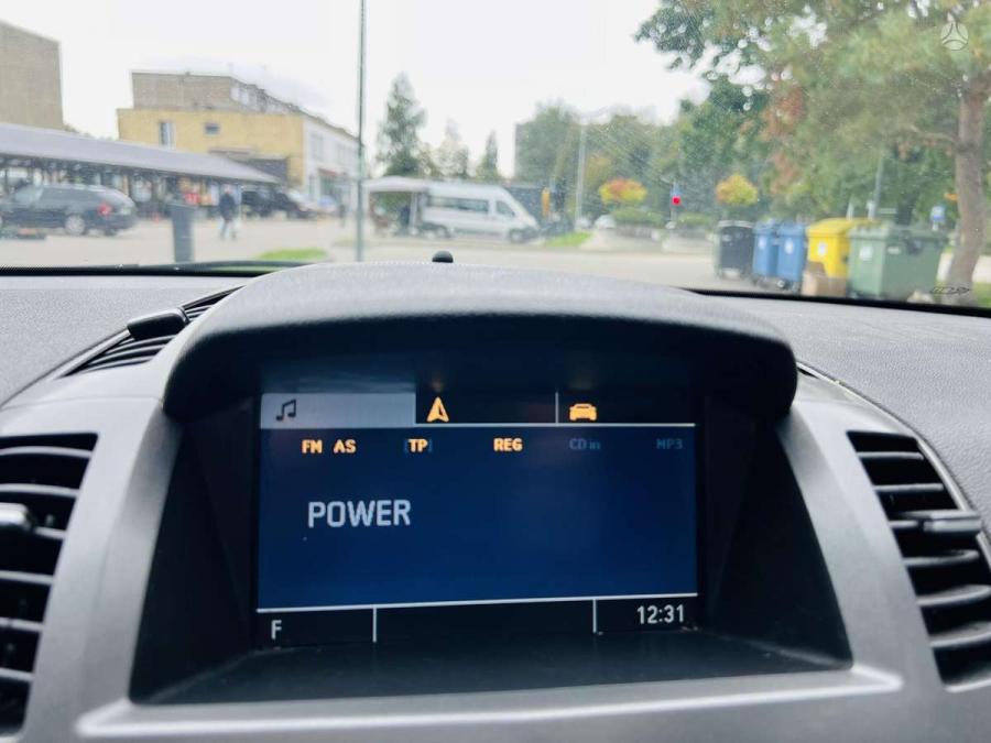 Black Opel Zafira 2007 in Marijampole, with an engine capacity of 1.91 L and mileage of 369 thousand km for 1400 €, photo 11 on AUTOMOTO.COM.LV