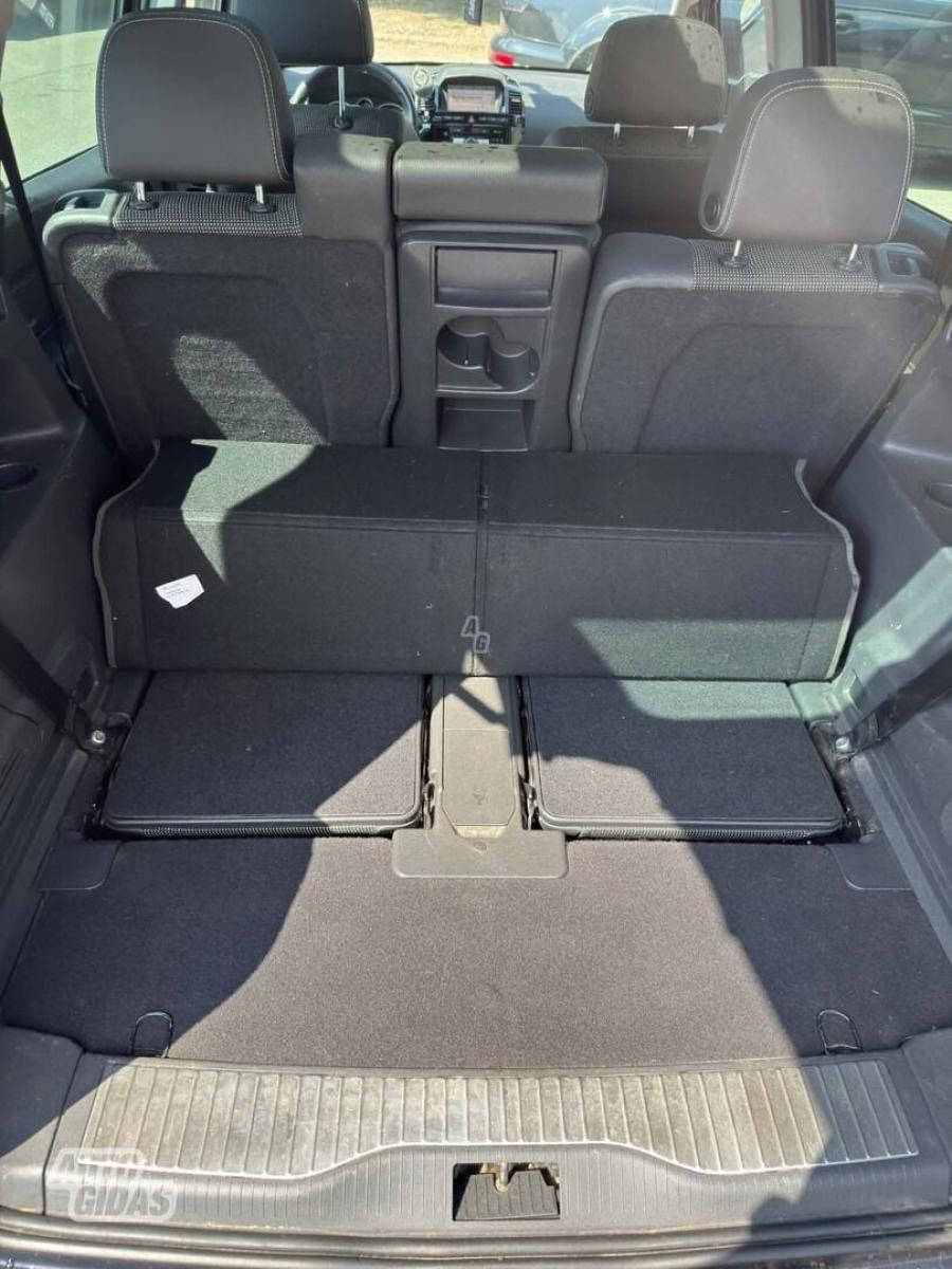 Melns Opel Zafira 2008 Viļņa, ar dzinēja tilpumu 1.90 L un nobraukumu 300 tūkst. km par 2600 €, foto 14 vietnē AUTOMOTO.COM.LV