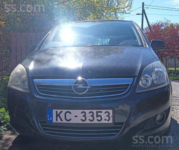 Black Opel Zafira 2010 in Riga, with an engine capacity of 1.70 L and mileage of 266 thousand km for 2200 €, photo 1 on AUTOMOTO.COM.LV