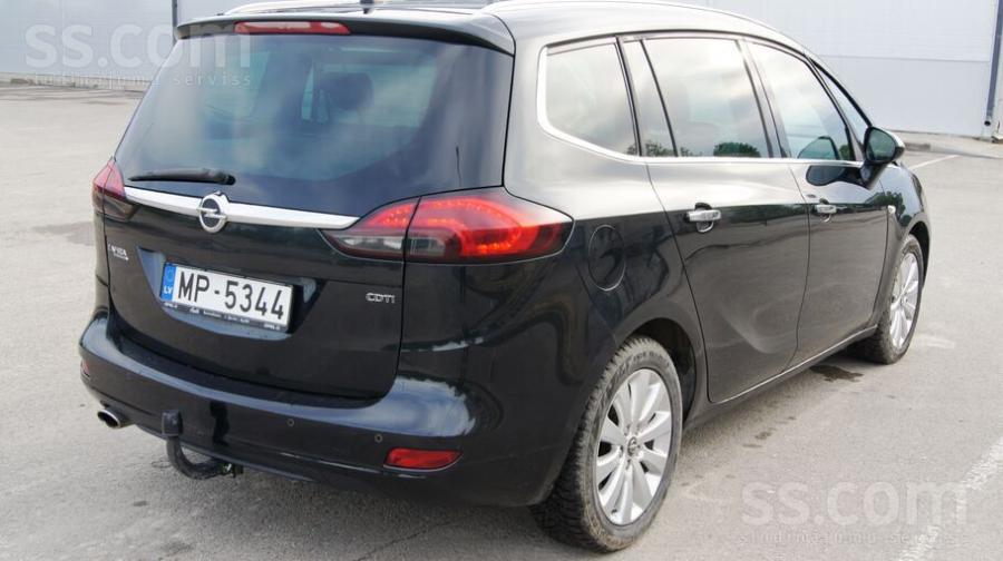 Black Opel Zafira 2012 in Jekabpils, with an engine capacity of 2.00 L and mileage of 331 thousand km for 4750 €, photo 4 on AUTOMOTO.COM.LV