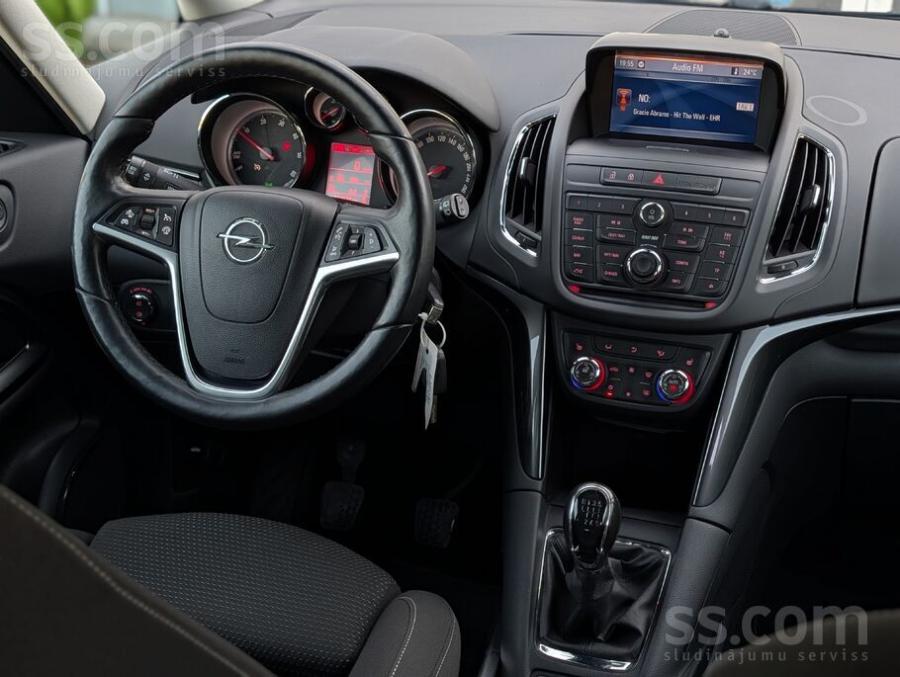 Black Opel Zafira 2013 in Jurmala, with an engine capacity of 1.60 L and mileage of 232 thousand km for 6950 €, photo 21 on AUTOMOTO.COM.LV
