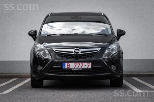 Black Opel Zafira 2013 in Riga, with an engine capacity of 2.00 L and mileage of 236 thousand km for 5950 €, photo 3 on AUTOMOTO.COM.LV