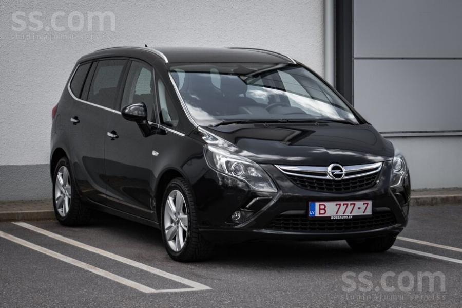 Black Opel Zafira 2013 in Riga, with an engine capacity of 2.00 L and mileage of 236 thousand km for 5950 €, photo 4 on AUTOMOTO.COM.LV