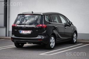 Black Opel Zafira 2013 in Riga, with an engine capacity of 2.00 L and mileage of 236 thousand km for 5950 €, photo 5 on AUTOMOTO.COM.LV
