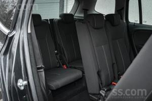 Black Opel Zafira 2013 in Riga, with an engine capacity of 2.00 L and mileage of 236 thousand km for 5950 €, photo 14 on AUTOMOTO.COM.LV