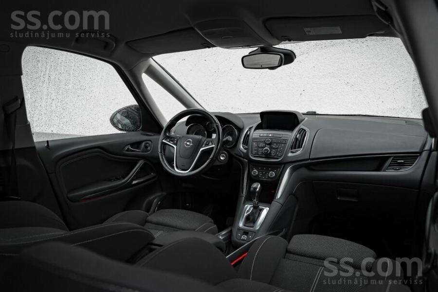 Black Opel Zafira 2013 in Riga, with an engine capacity of 2.00 L and mileage of 236 thousand km for 5950 €, photo 16 on AUTOMOTO.COM.LV