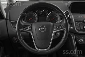 Black Opel Zafira 2013 in Riga, with an engine capacity of 2.00 L and mileage of 236 thousand km for 5950 €, photo 19 on AUTOMOTO.COM.LV
