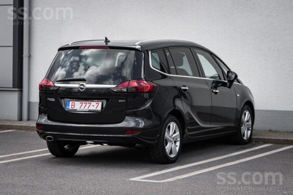 Opel Zafira 2013 Rīga vietnē Melns Opel Zafira 2013 Rīga, ar dzinēja tilpumu 2.00 L un nobraukumu 236 tūkst. km par 5950 €, foto 5 vietnē AUTOMOTO.COM.LV