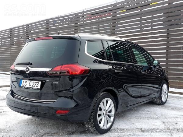 Black Opel Zafira 2014 in Riga, with an engine capacity of 2.00 L and mileage of 244 thousand km for 7396 €, photo 5 on AUTOMOTO.COM.LV