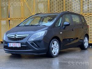 Black Opel Zafira 2014 in Ogre, with an engine capacity of 2.00 L and mileage of 217 thousand km for 6995 €, photo 2 on AUTOMOTO.COM.LV