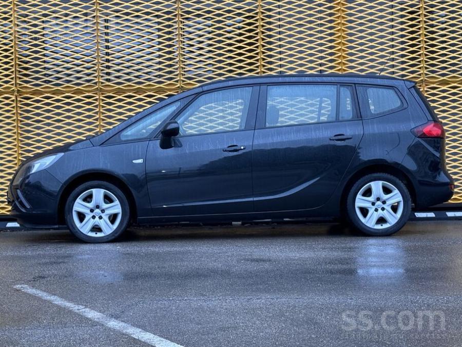 Black Opel Zafira 2014 in Ogre, with an engine capacity of 2.00 L and mileage of 217 thousand km for 6995 €, photo 8 on AUTOMOTO.COM.LV